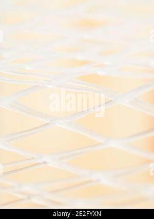Beige network pattern close-up texture as background Stock Photo - Alamy