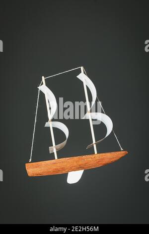 Toy boat made of oak bark. Wooden tiny sailing ship Stock Photo - Alamy