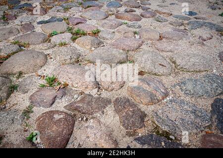 Old stone path texture.Medieval cobblestone pavement background Stock ...