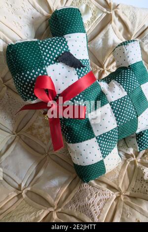Handmade Patchwork dog stuffed animal on a vintage quilt, USA Stock ...