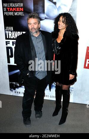 Luc Besson and his wife arriving at the French Premiere of the movie ...