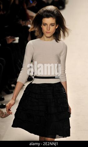 Model Tatiana Cotliar displays a creation by designer Karl Lagerfeld ...