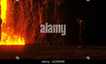Sinner. A lonely sinfull man stands in front of a hell gates. Hell fire ...