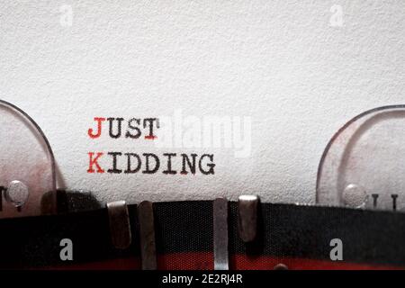 Just kidding phrase written with a typewriter Stock Photo - Alamy