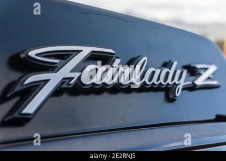 A black Datsun 280Z sports car, also known as the Nissan S30 Fairlady Z ...