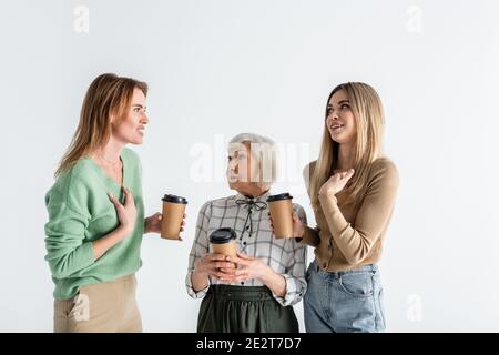 Grandmother arguing her granddaughter isolated on white background ...