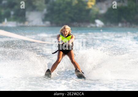 a young woman water skiing on a sea Stock Photo - Alamy