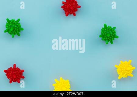 multicolored balloons coronavirus symbol on blue background with copy ...