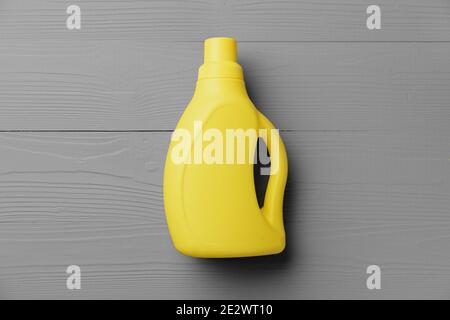Yellow liquid detergents containers on gray background Stock Photo - Alamy