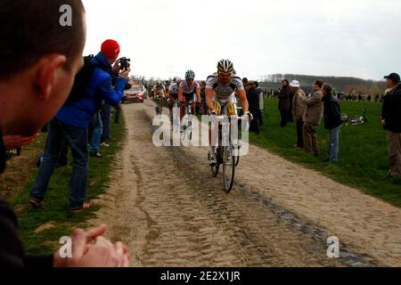 Riders on the cobblestone section "Pont-Thibaut" during the 108th ...