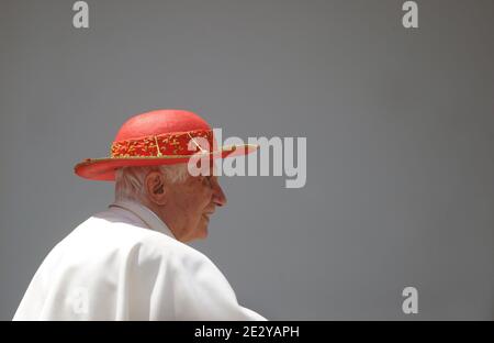 Sunny day in Rome: Pope Benedict XVI wears his red Saturn hat, named ...