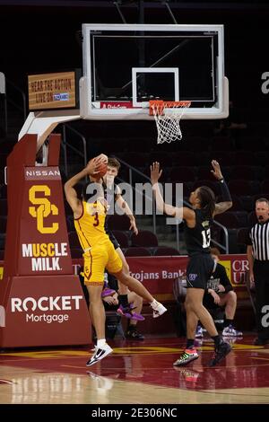 Washington guard Cole Bajema (22) drives to the basket while defended ...