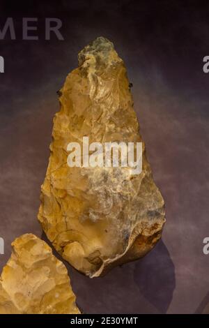 A Paleolithic flint hand axe from the Dordogne, France, found in a ...