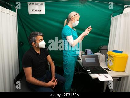 GP Mary Behan administering the Moderna vaccine against COVID-19 to GP ...