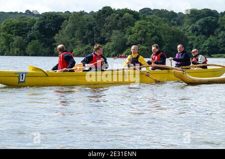 People paddling V6 Hawaiian outrigger canoes (known as va'a), UK Stock ...