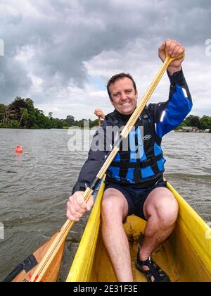 People paddling V6 Hawaiian outrigger canoes (known as va'a), UK Stock ...