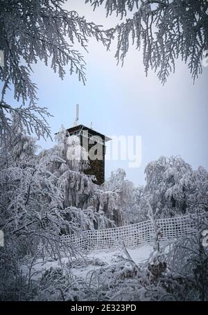 Czorneboh mountain tower in germany saxony during winter season snow ...