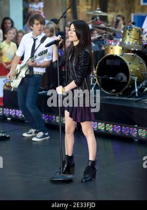 Singer Miranda Cosgrove signs autographs following her performance ...