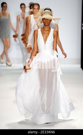 Models display a creation by the Project Runway designer for the show's ...