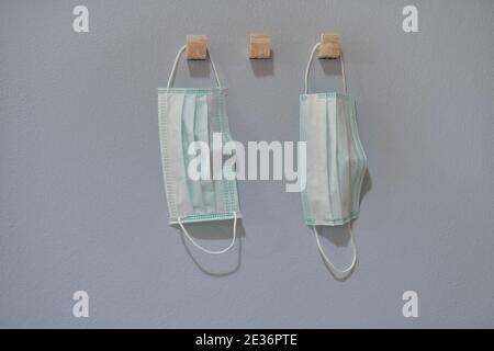 The surgical masks hanging on the wall Stock Photo - Alamy
