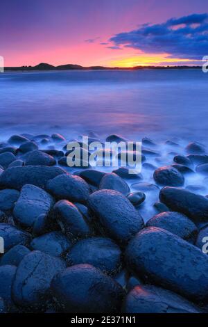 Stony beach in Northumberland, Great Britain Stock Photo - Alamy
