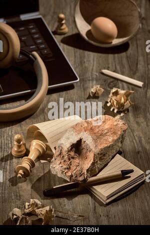 Paper notebook with blank pages, crumpled paper balls and crayons ...