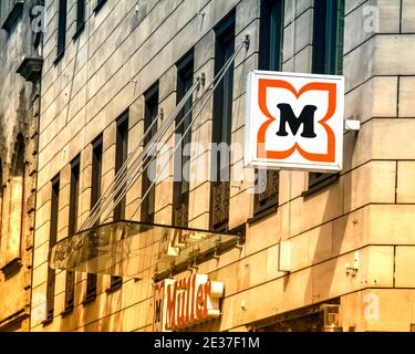 Munich, Germany : entrance to the Muller store. Muller Ltd. & Co. KG is ...