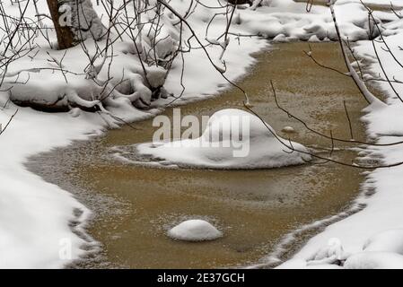 Almost frozen river in January Stock Photo - Alamy