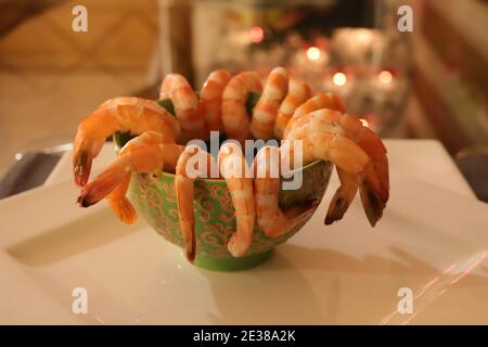 Whole skinned prawns in a bowl Stock Photo - Alamy