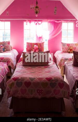 Interior of comfortable children bedroom furnished with bed wooden ...