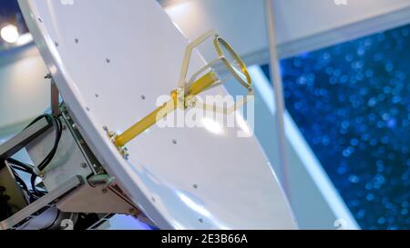 White rotating satellite dish antenna using to receive or transmit information Stock Photo - Alamy