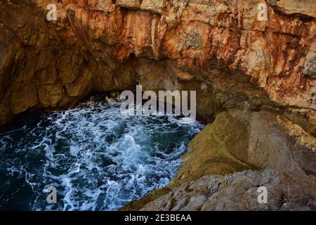 Shot of natural sea inlet at the end of a Maltese valley, Maltese ...