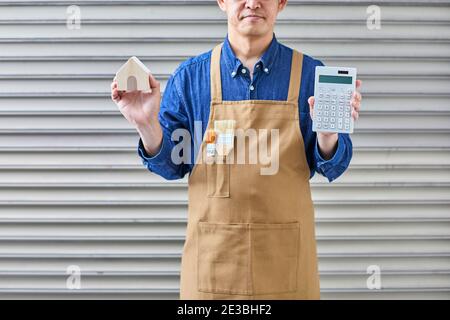 Japanese man doing DIY Stock Photo - Alamy