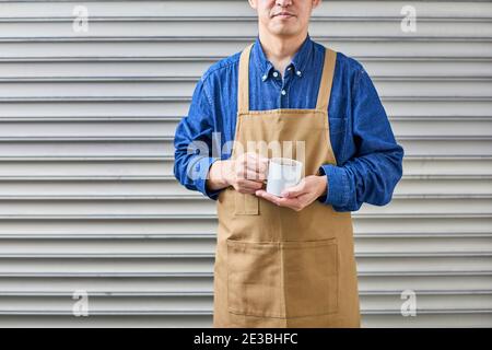 Japanese man doing DIY Stock Photo - Alamy