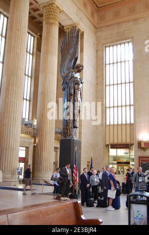 angel with big wings looking down Stock Photo - Alamy