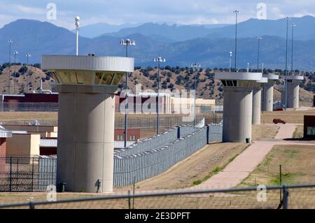 Guard towers surround the federal penitentiary facility known as ...