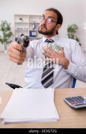 Angry bookkeeper in bankruptcy concept Stock Photo - Alamy