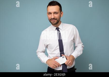 Handsome good looking brunet unshaven man with beard wearing casual ...