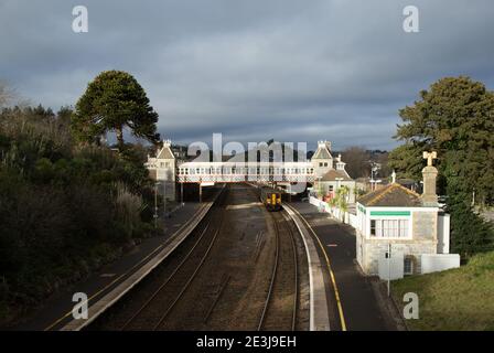 Railway station at Torquay, Devon, with train en route to Paignton ...