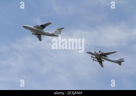 Russian military aircrafts fly in formation over Red Square during ...