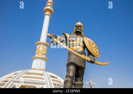 Turkmen statues in front of the Independence Monument in Ashgabat ...