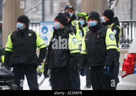 Montreal,Quebec,Canada,December 20,2021.Police in full riot gear at a ...