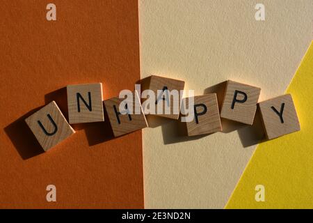 Unhappy, word with prefix Un crossed out leaving word with opposite ...