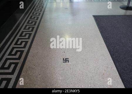 Swastikas on the floor at the entrance to Customs House library in ...