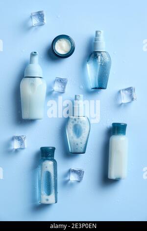 Moisturizing cosmetics on a wet background. Selective focus. Nature ...