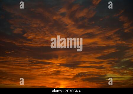 No fake dramatic sunset with clouds in orange Stock Photo - Alamy