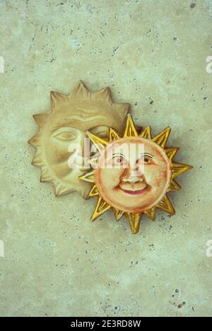 Plaster model of smiling sun with friendly face Stock Photo - Alamy