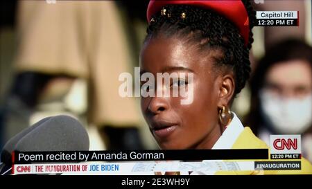 A CNN TV screen shot of Amanda Gorman, the first U.S. youth poet laureate, reading her poem at ...