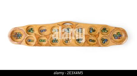 Malay traditional board game called Congkak isolated on white with ...
