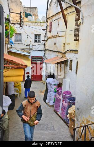 Fez, Morocco - November 20th 2014: Unidentified people on archway Bab ...